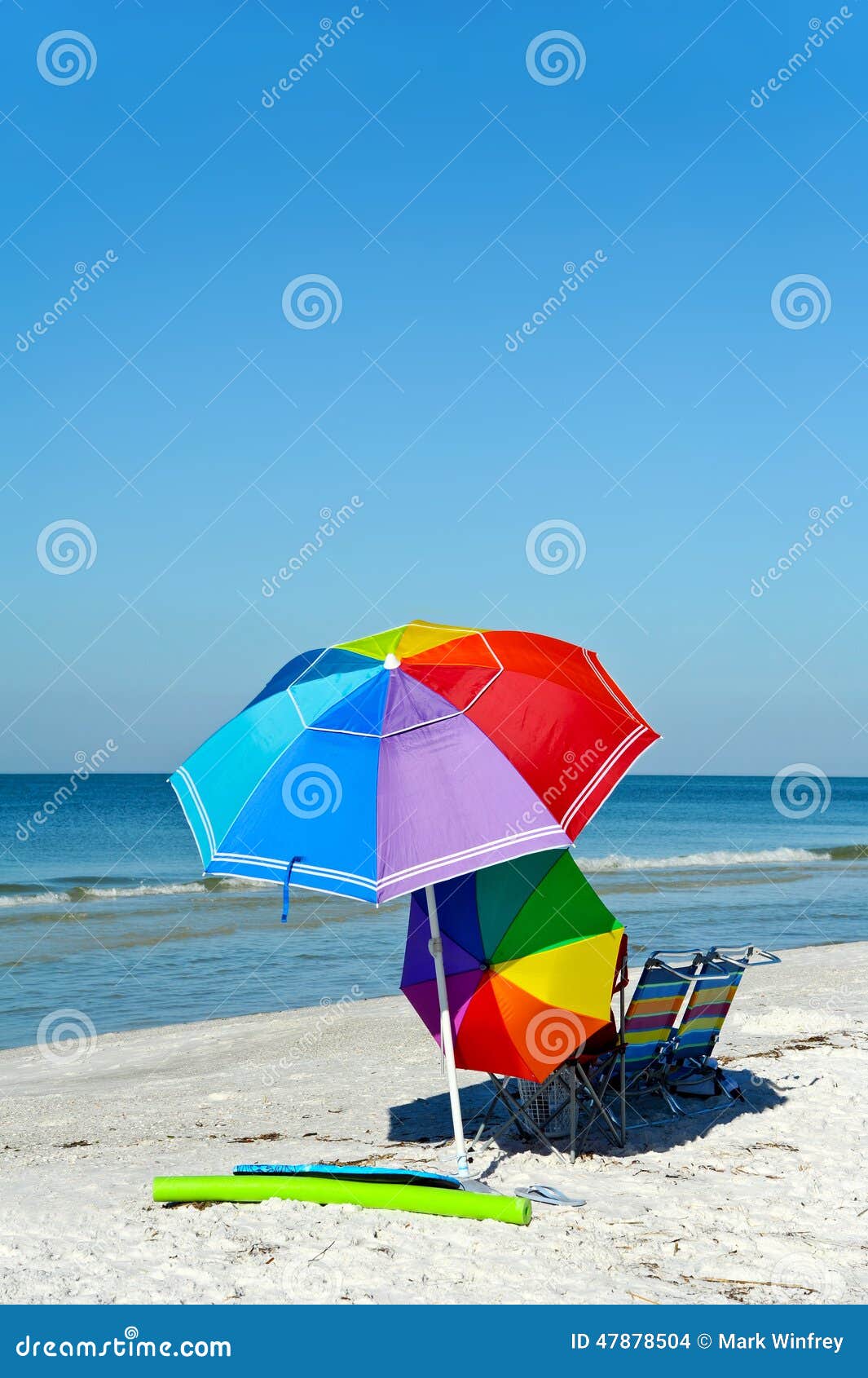 Beach Chairs with Bright Color Umbrellas Stock Photo - Image of blue ...