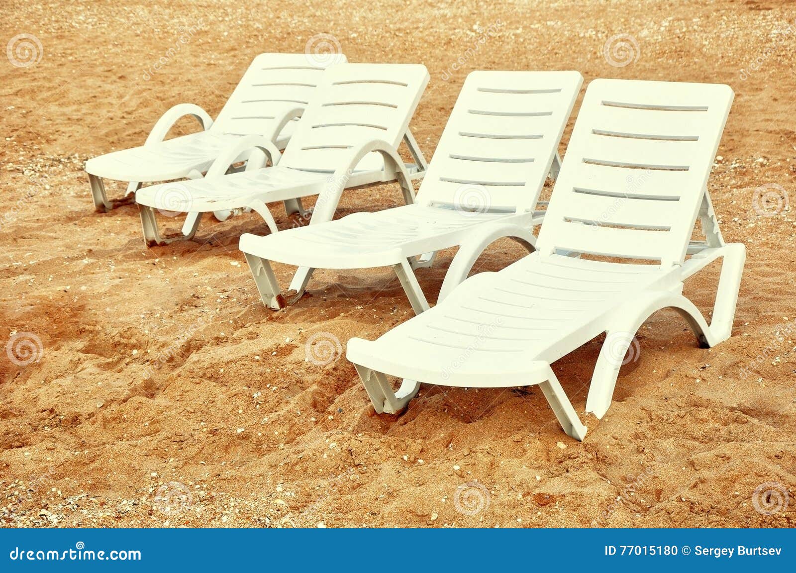 Beach chairs on the sand stock photo. Image of island - 77015180