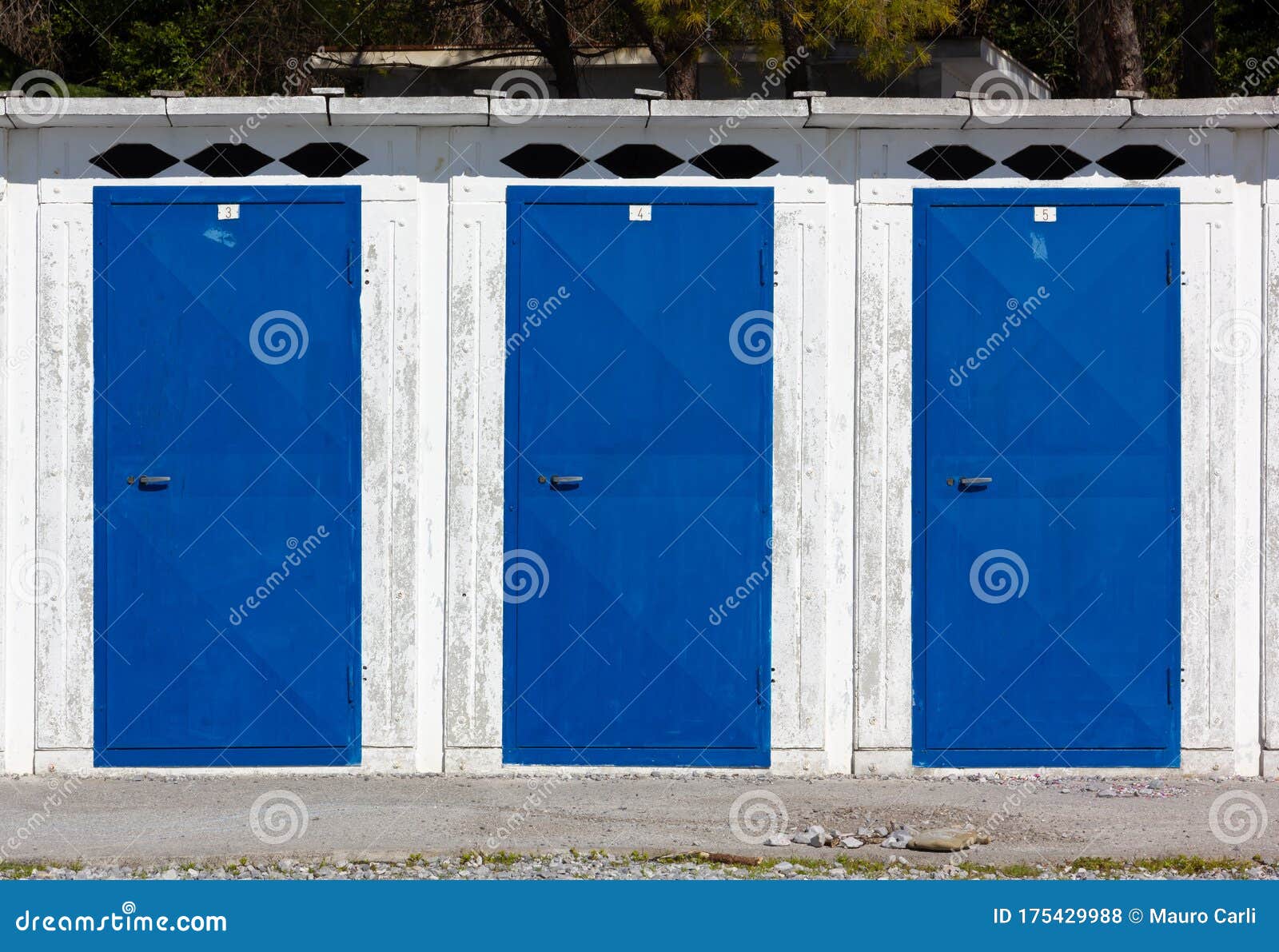 Beach Changing Cabins with Blue Doors Stock Photo - Image of vegetation ...