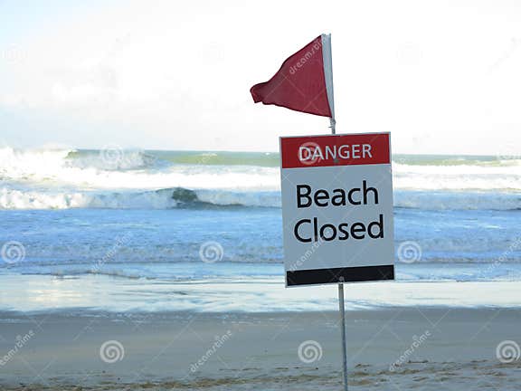 Beach Closed Warning Sign by Dangerour Conditions Stock Image - Image ...