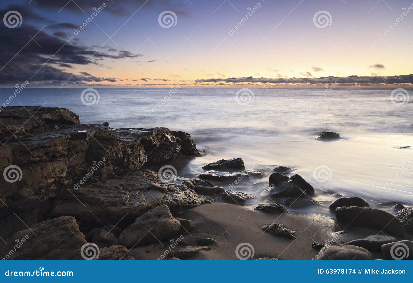Beach at Dusk stock photo. Image of cormorant, dawn, cove - 63978174