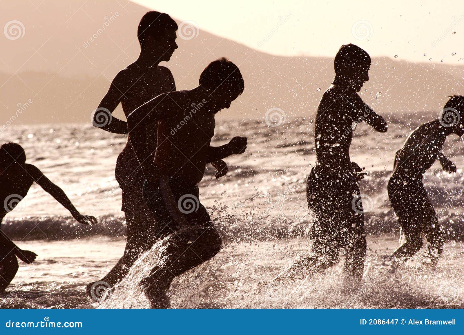 Beach Exuberance stock image. Image of children, cool - 2086447