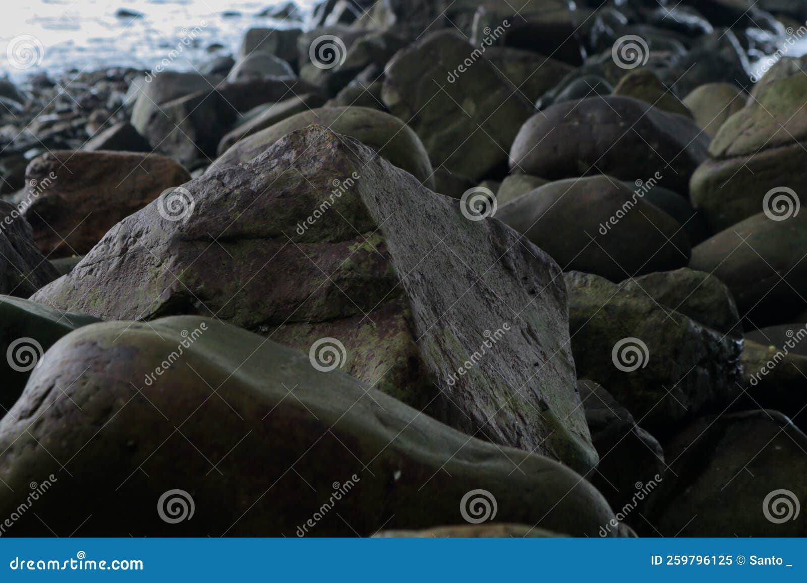 The Beach is Full of Rocks and Waves Stock Image - Image of statue ...