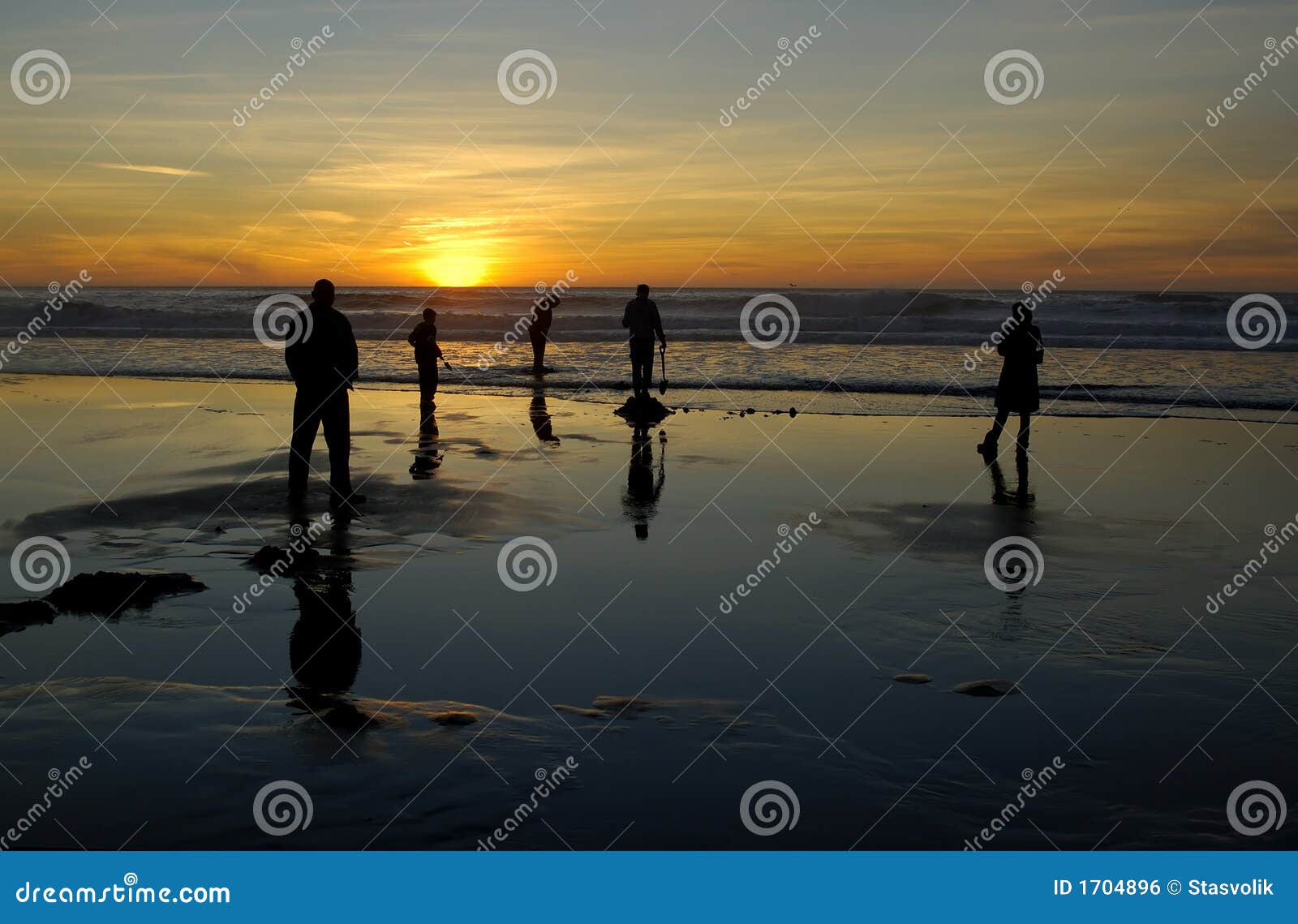 Beach fun at sunset stock photo. Image of orange, colorful - 1704896
