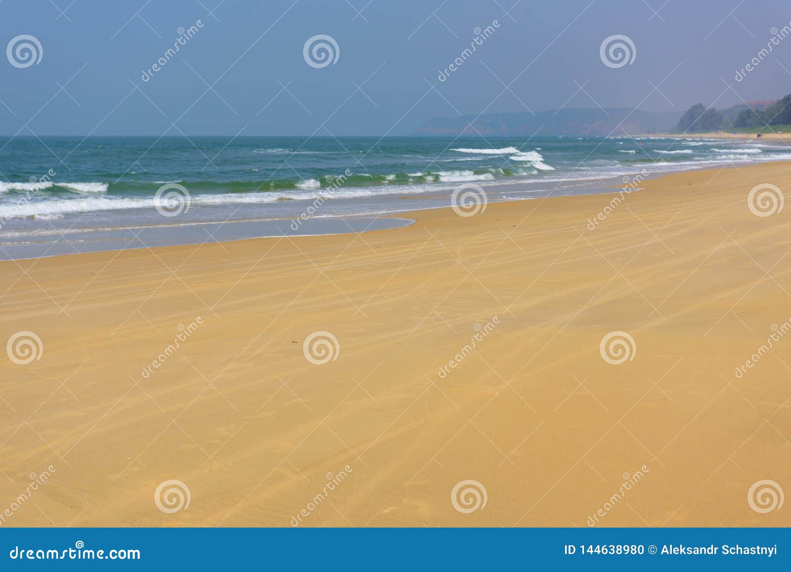 Beach in Goa, India. Sea Waves and Bright Yellow Sand Stock Photo ...