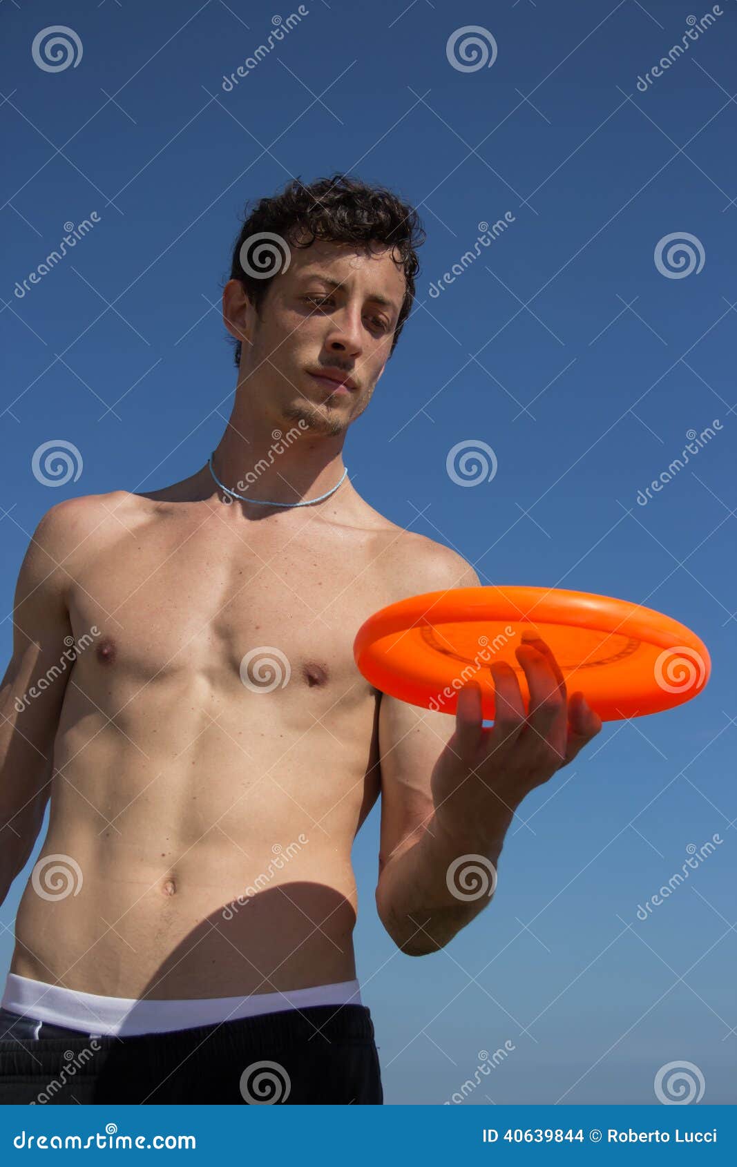 Beach Guy Playing with Frisbee Stock Photo - Image of play, action ...