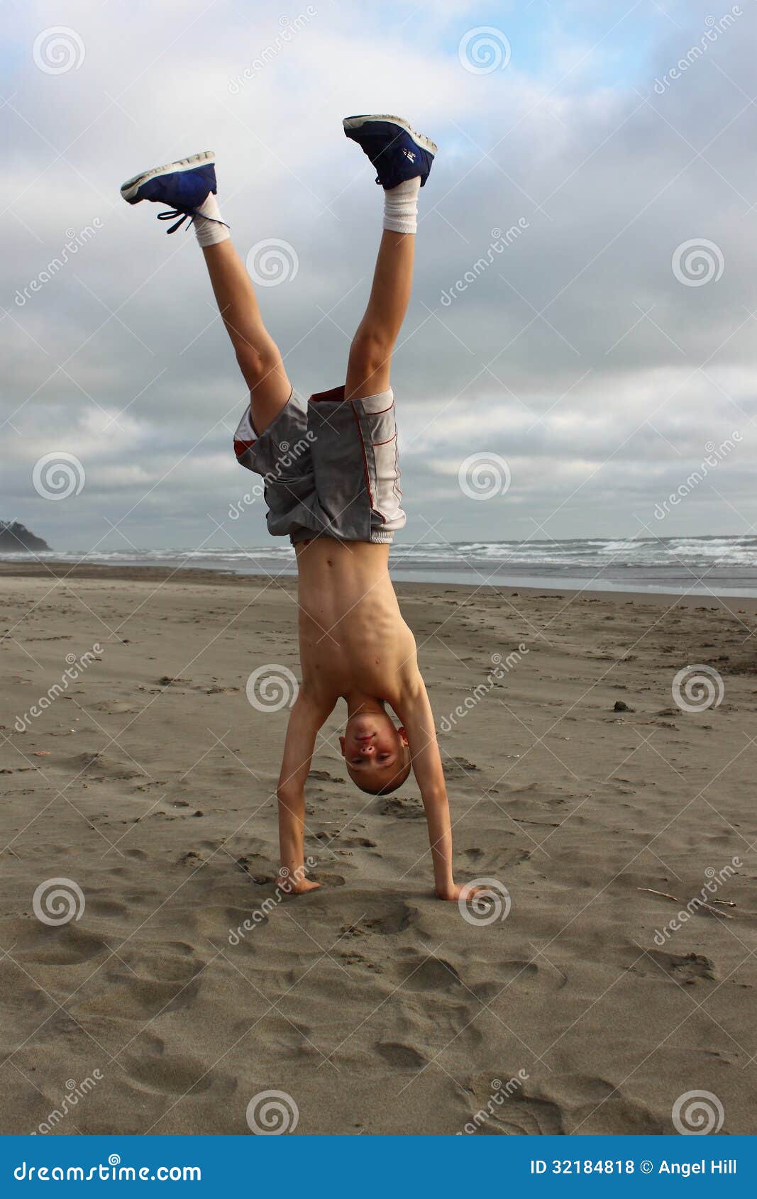 Boy Doing A Handstand On The Beach Stock Image | CartoonDealer.com ... Boy Doing A Handstand On The Beach Stock Image | CartoonDealer.com ...