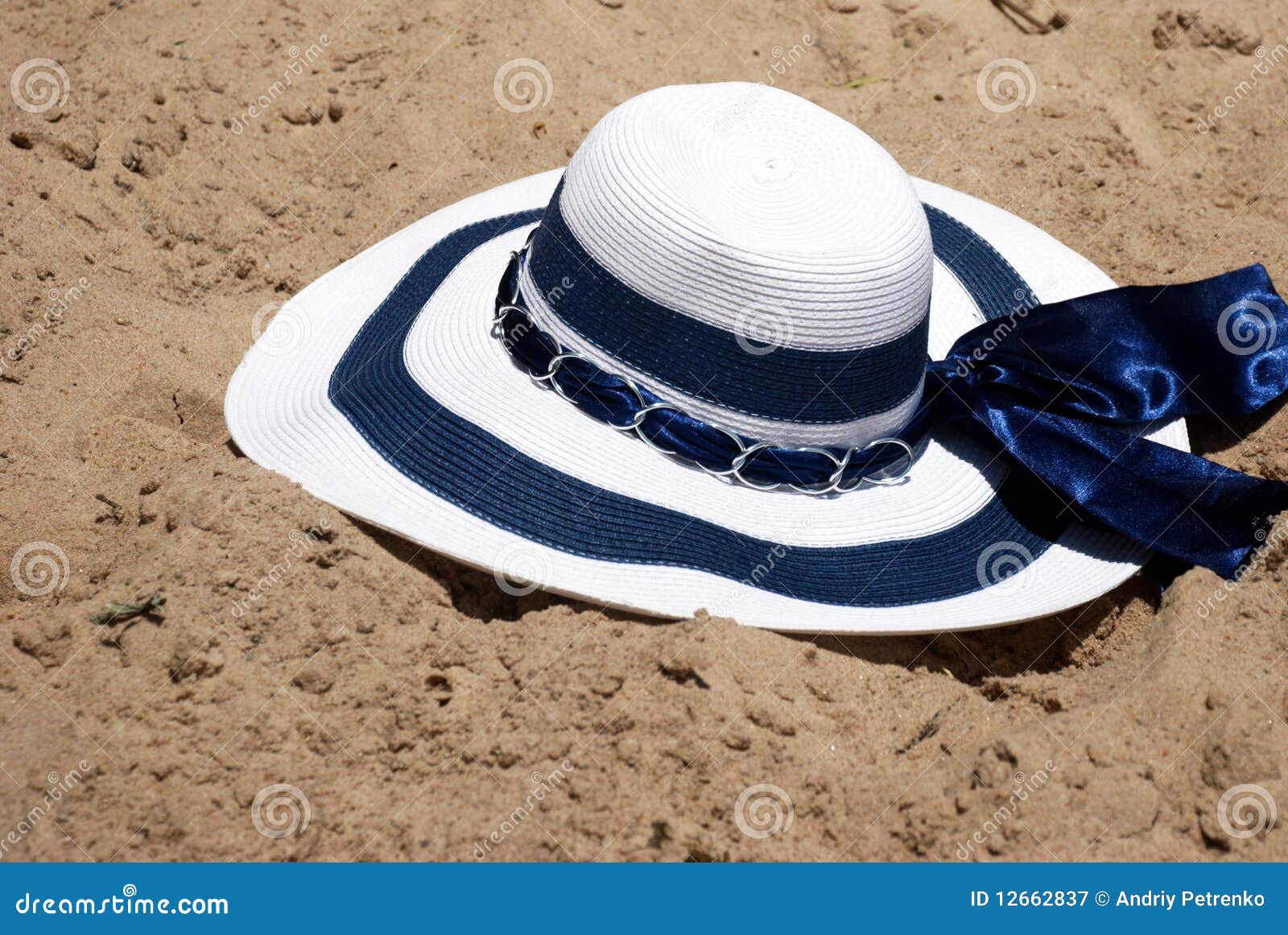 The beach hat in sand stock image. Image of closeup, cool - 12662837