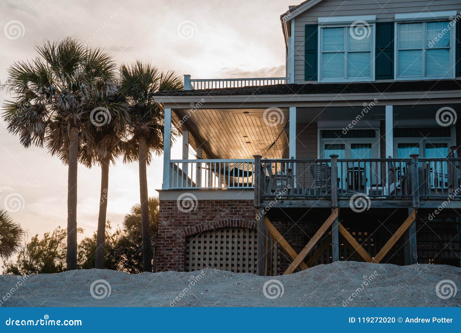 Beach House during a Sunset Stock Photo - Image of waterfall, morning ...