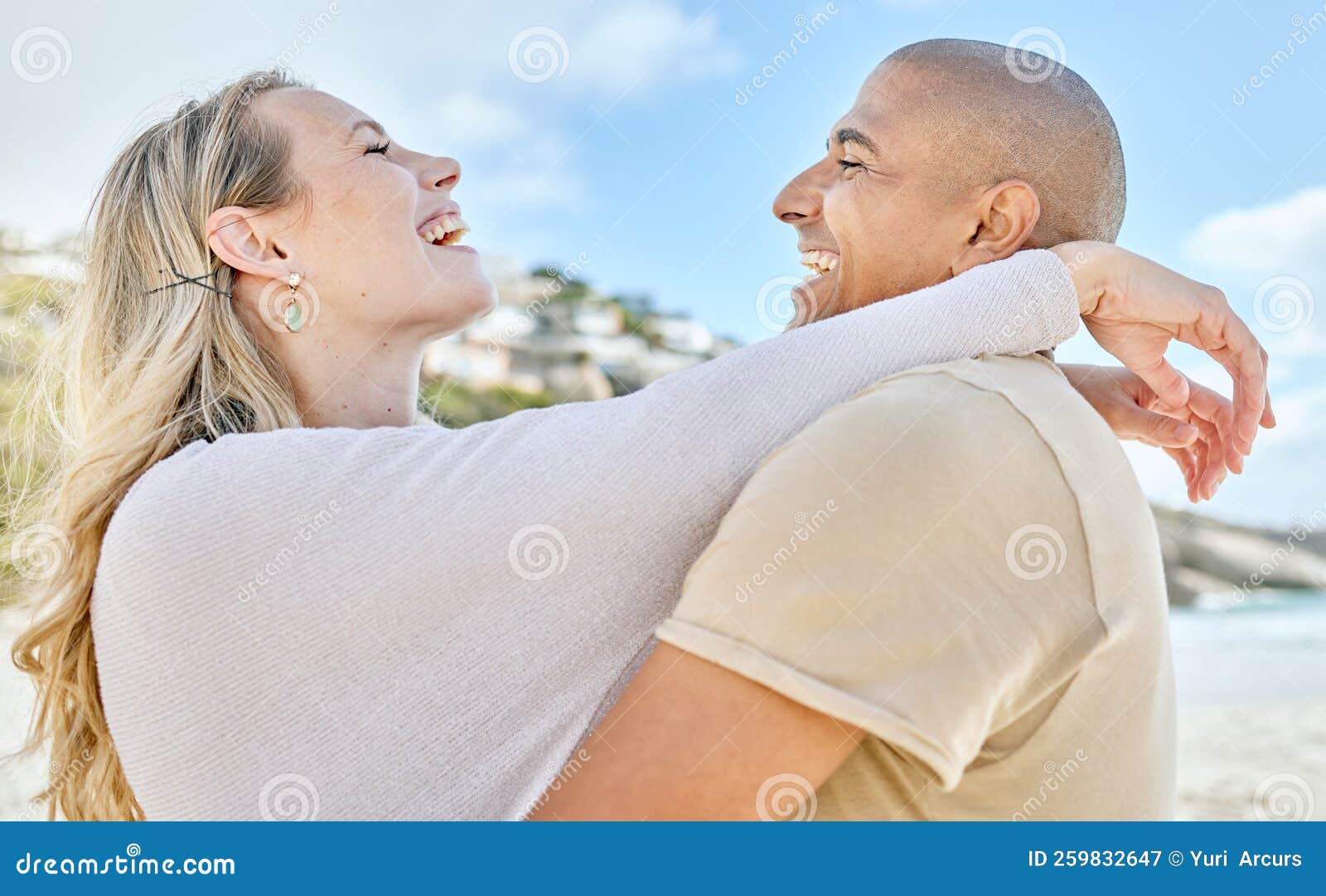 Beach Hug And Interracial Love Of Couple With Happy And Cheerful Smile