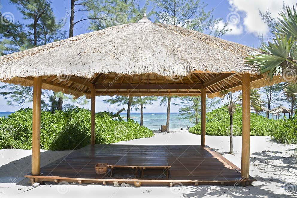 Beach Hut on Tropical Island Stock Image - Image of chairs, greenery ...