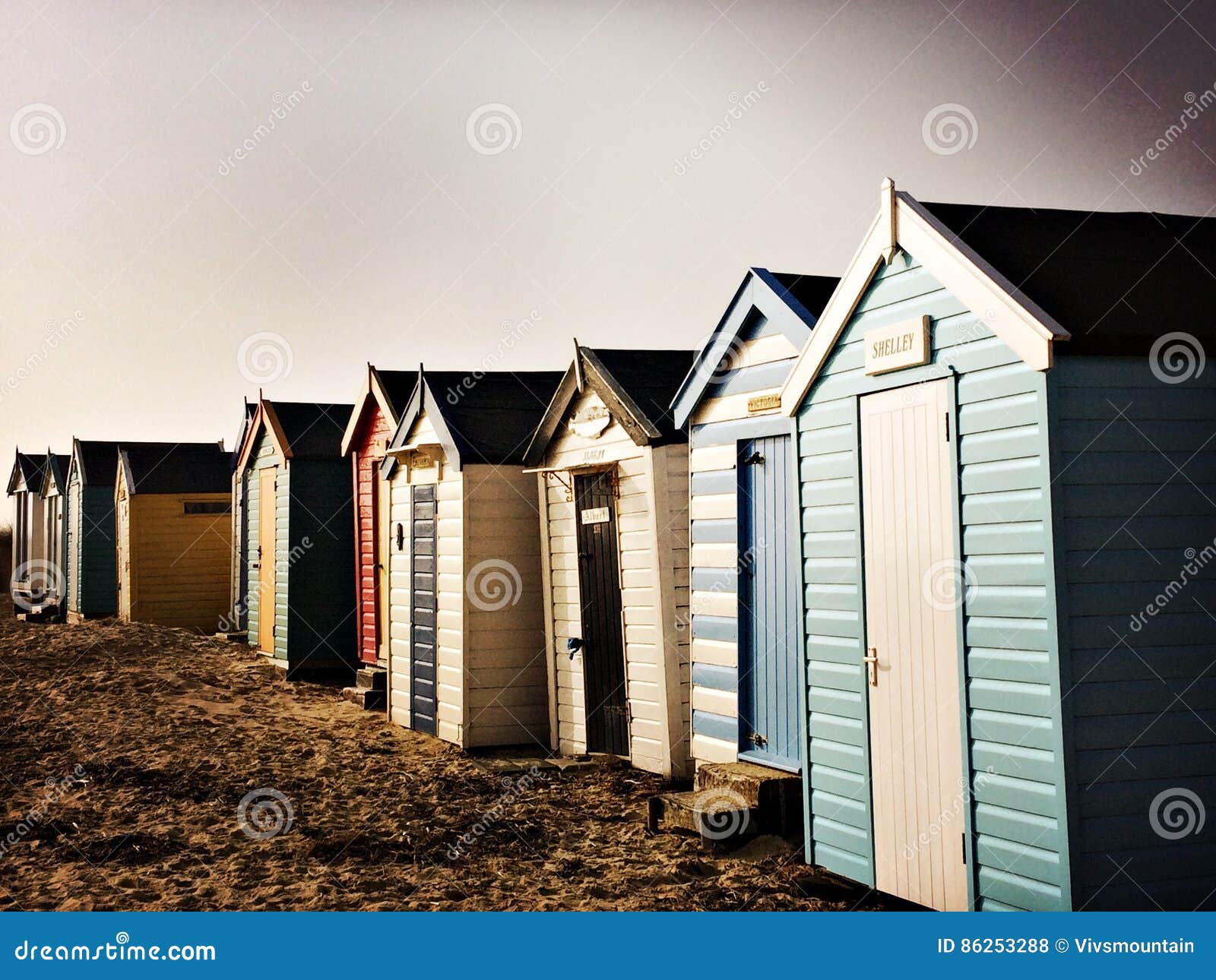 Beach Huts on the Sand on a Cold Winter Day Stock Photo - Image of sand ...