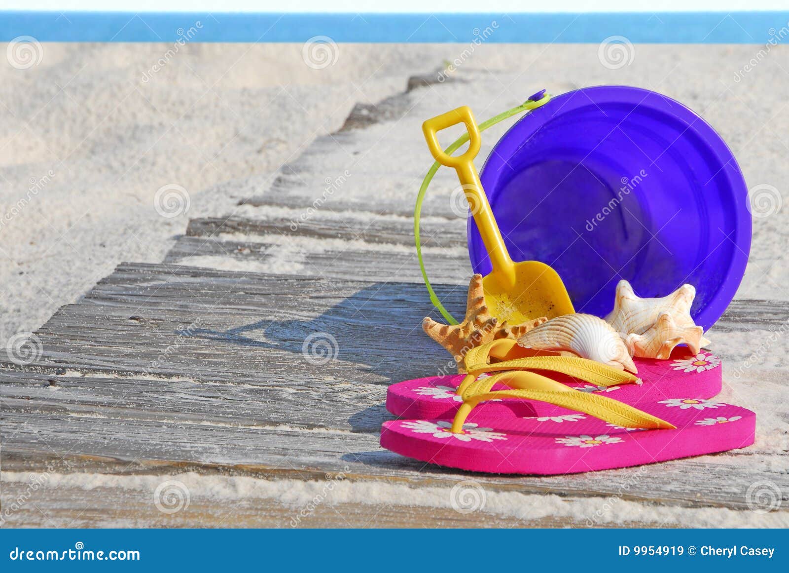 Beach items on boardwalk stock image. Image of tropical - 9954919