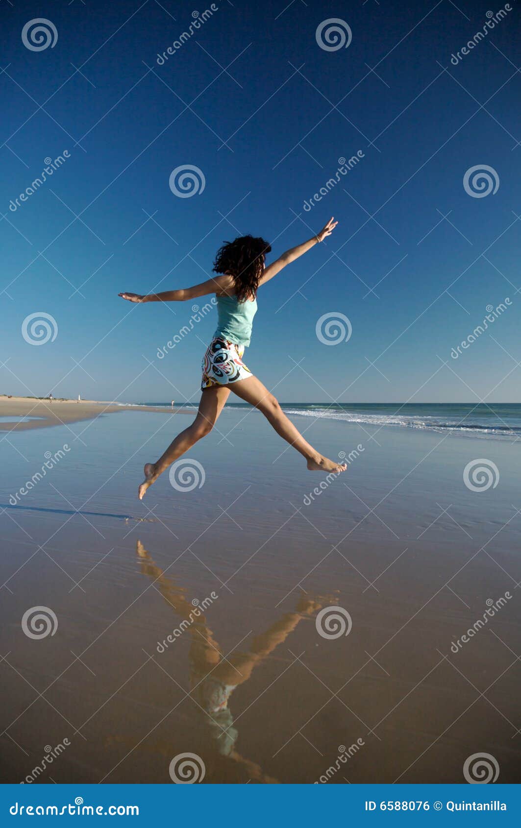 Beach jumping reflected stock photo. Image of cadiz, enjoy - 6588076