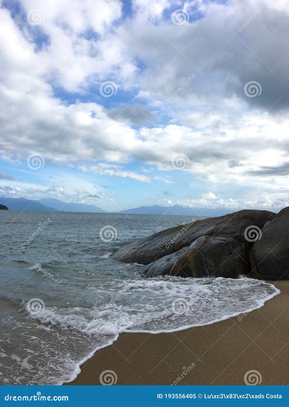 Rocks on the beach stock image. Image of summer, water - 193556405