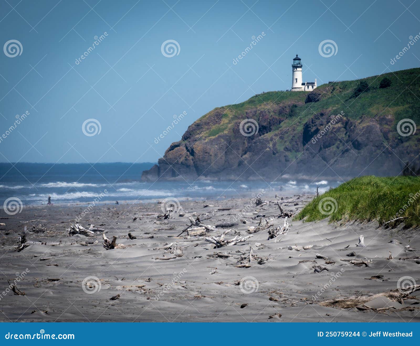 Beach with Lighthouse in the Distance at Cape Disappointment in Oregon ...