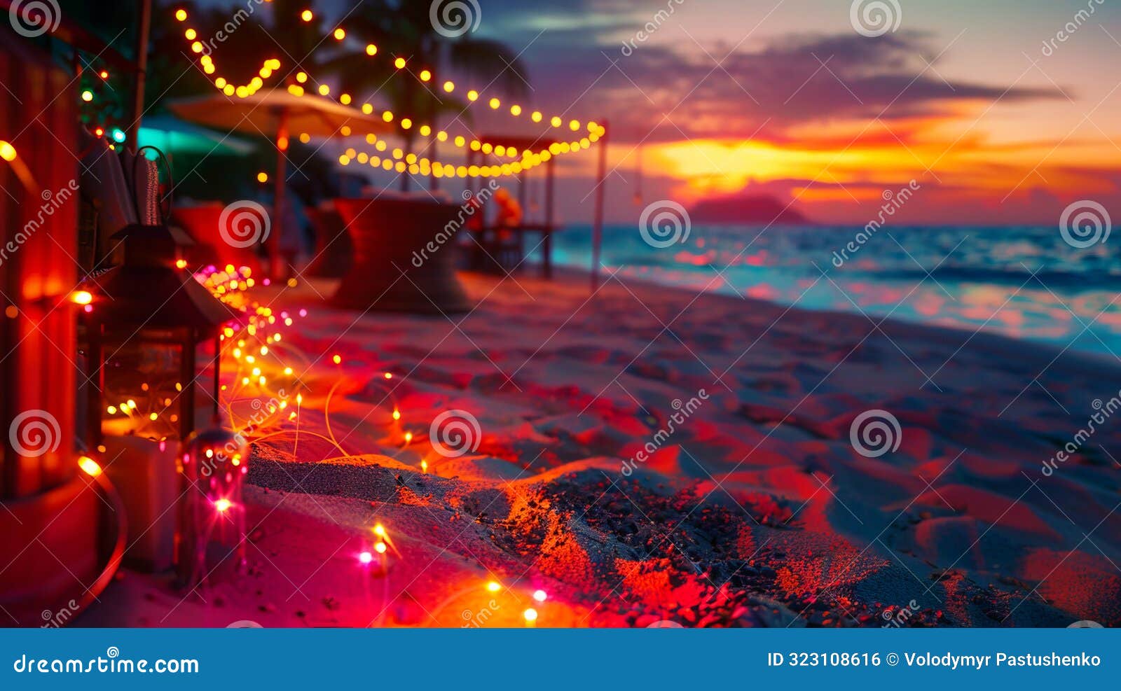 A Beach with Lights and Lanterns at Sunset Stock Photo - Image of water ...