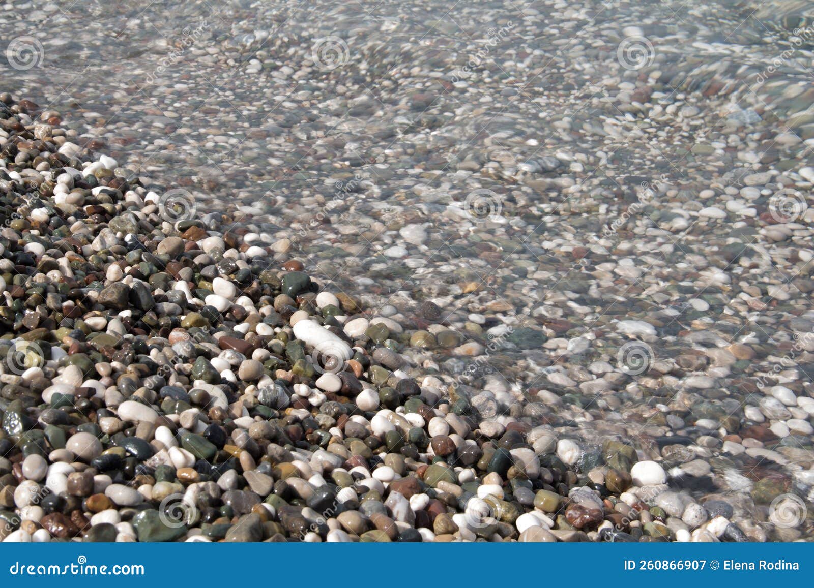 Small Colorful Pebbles and Water. the Beach is Made of Pebbles, the ...