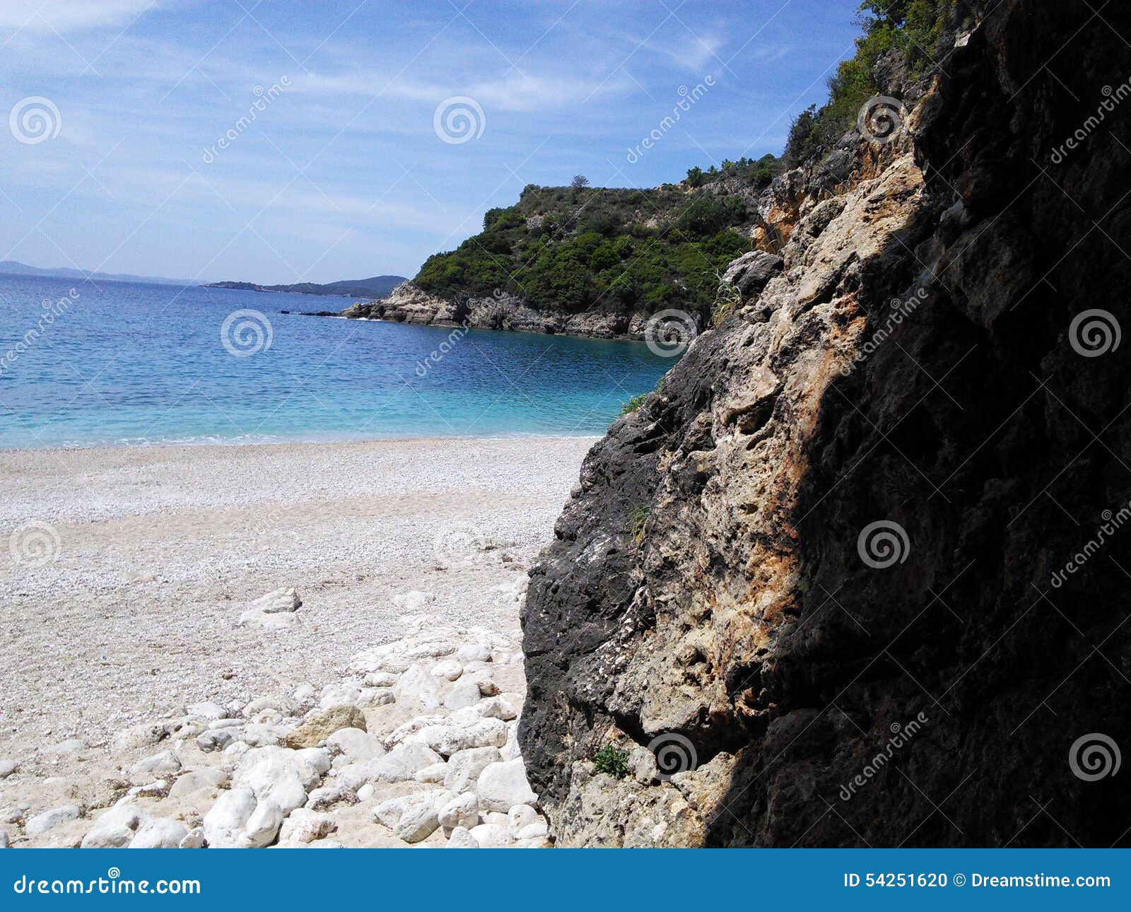 Beach at midday stock photo. Image of midday, rocks, beach - 54251620