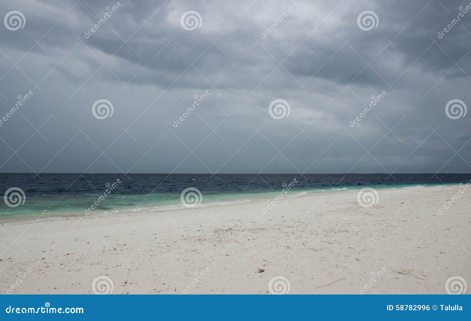The Beach and Ocean on a Cloudy Day Stock Photo - Image of horizon ...