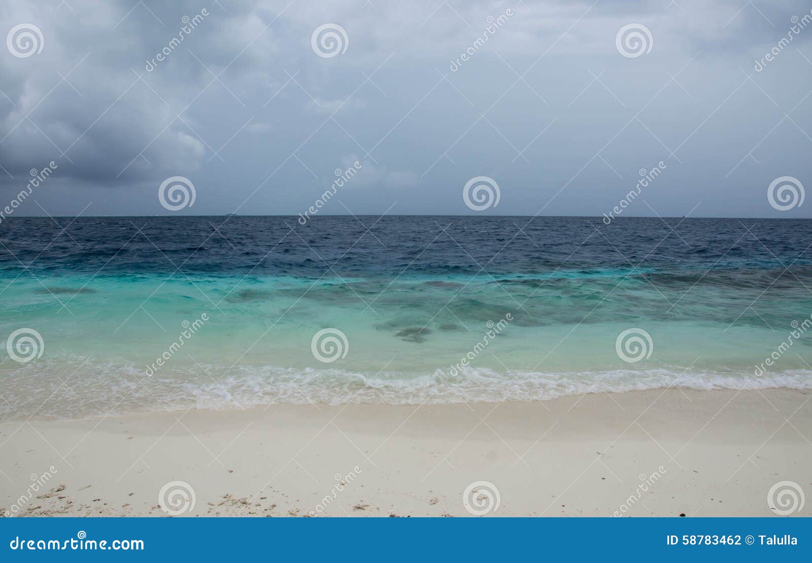 The Beach and Ocean on a Cloudy Day Stock Photo - Image of season ...