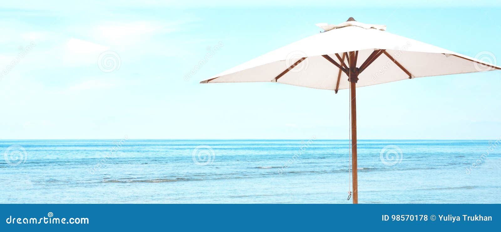 Beach Parasol on the sky stock photo. Image of seaside - 98570178