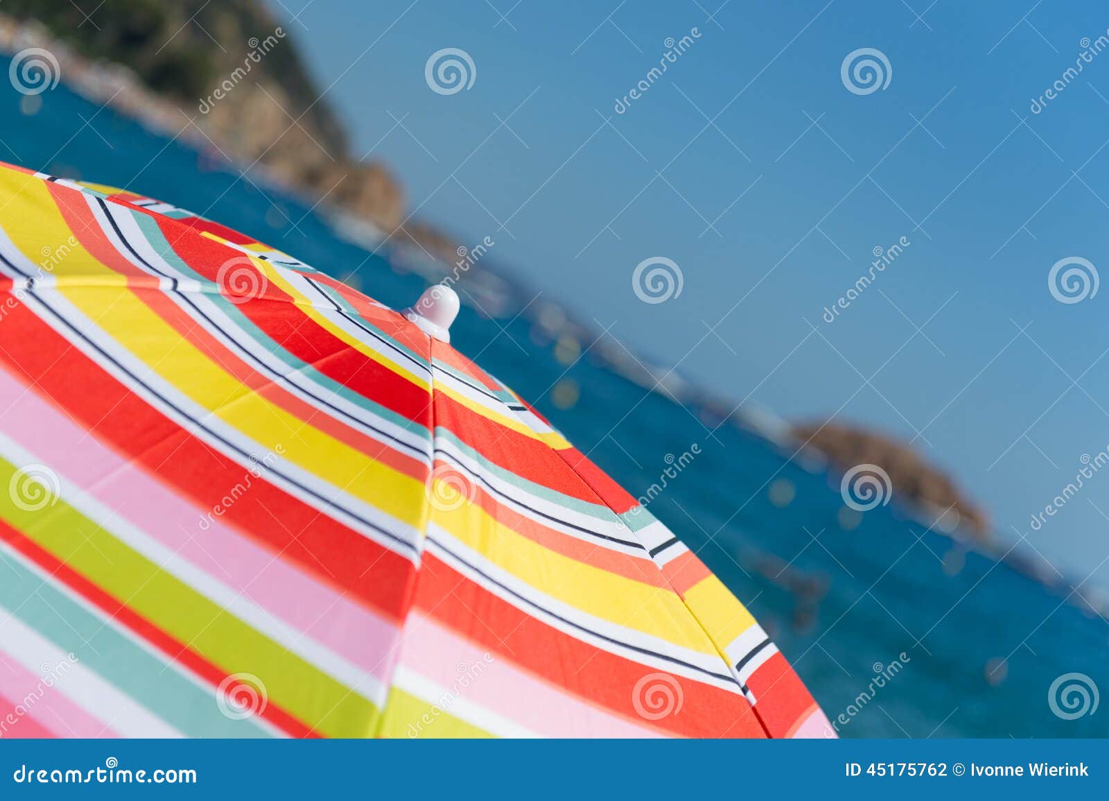 Beach with parasols stock photo. Image of vacations, water - 45175762