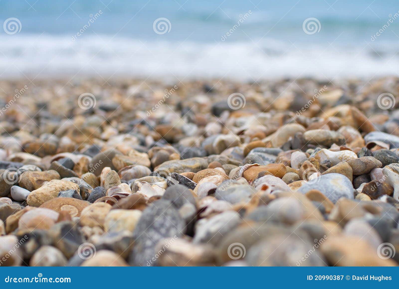 Beach pebbles and ocean stock image. Image of abstract - 20990387