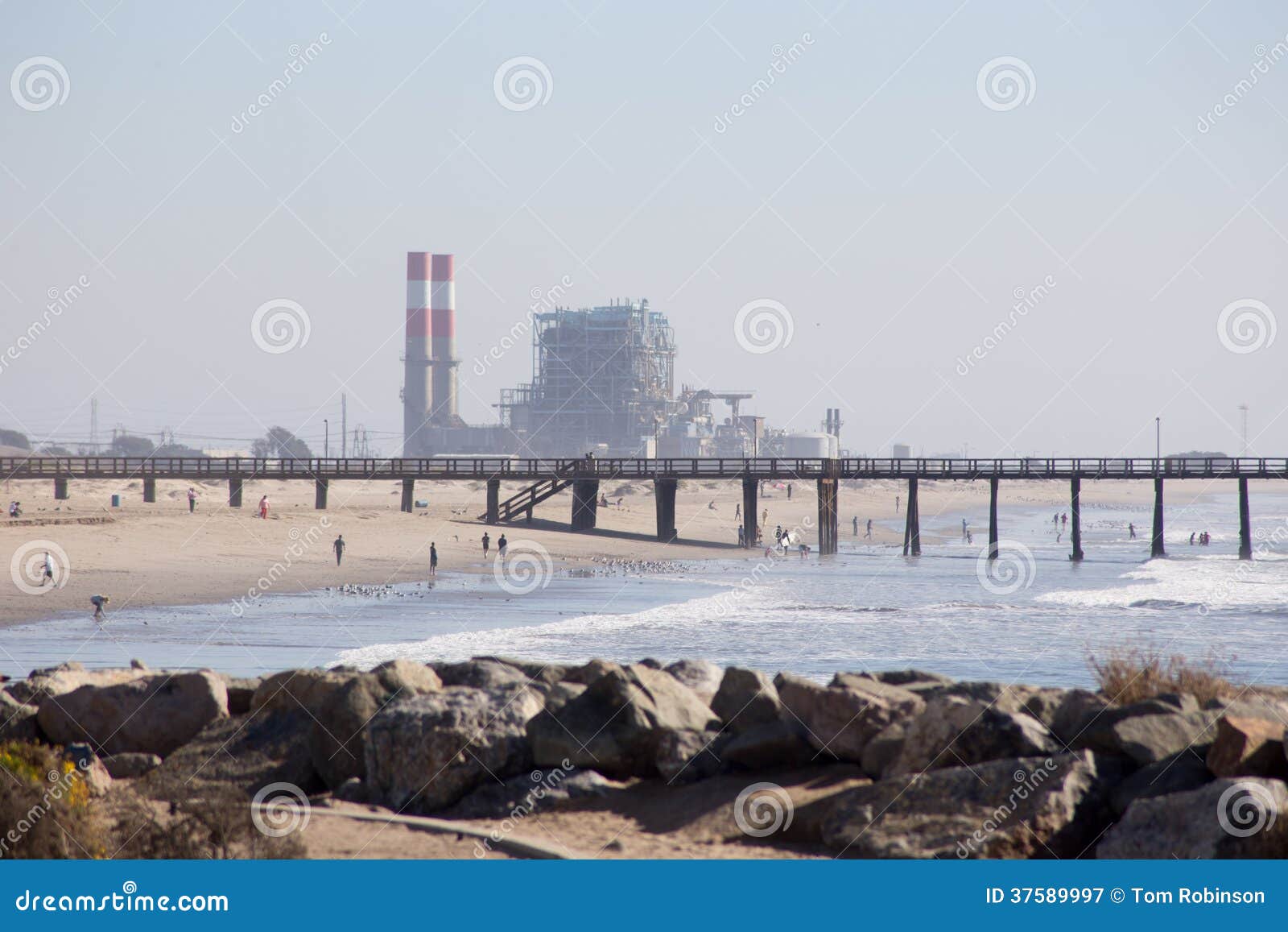 Beach with Pier and Power Plant and Jetty Stock Image - Image of swells ...