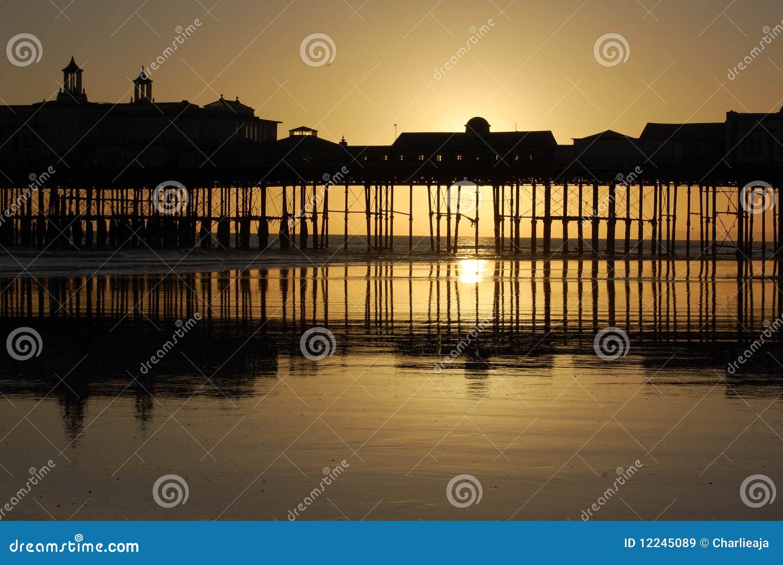 Beach pier reflection stock image. Image of relaxation - 12245089