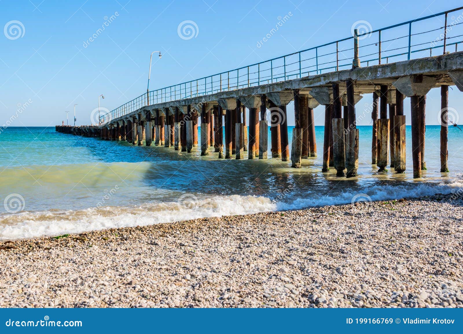 Pier going out to sea stock image. Image of ocean, pillars - 199166769
