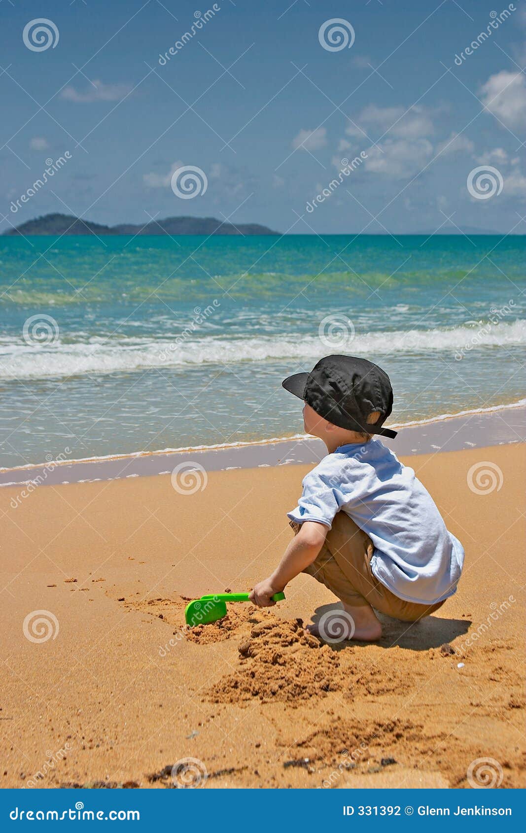 Beach play stock photo. Image of digging, child, sand, sunsmart - 331392