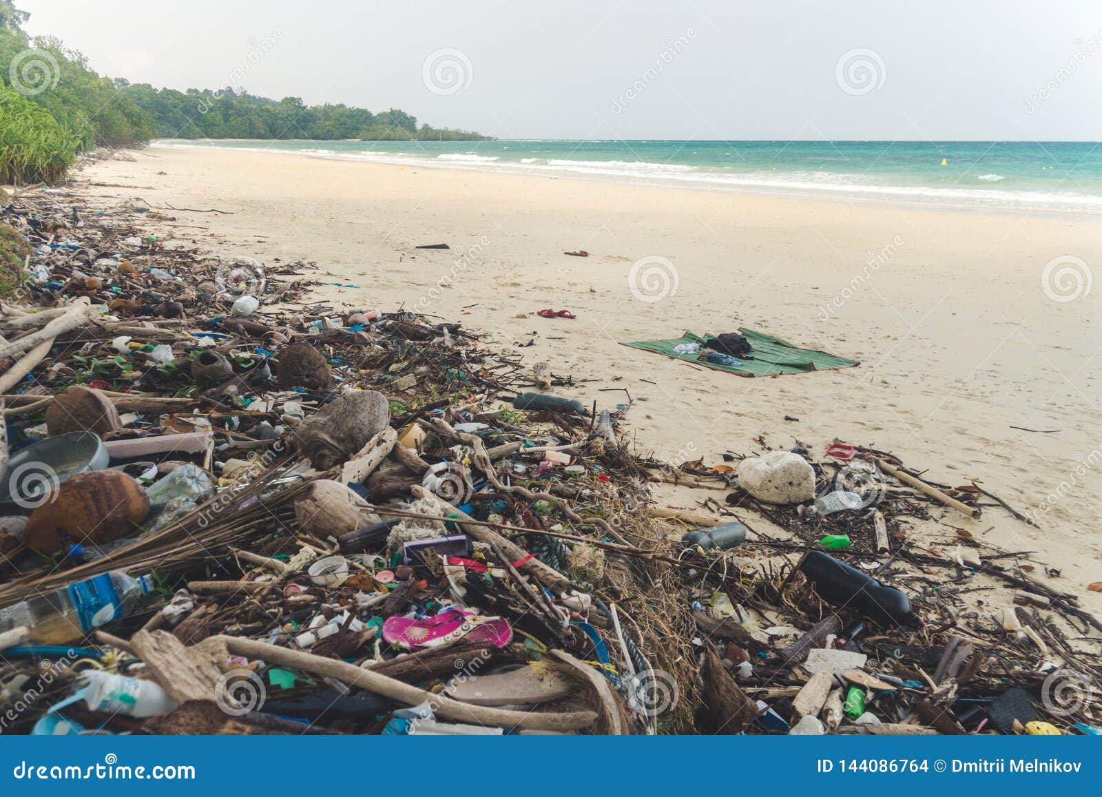 Beach Pollution. Plastic Bottles and Other Trash on Sea Beach Stock ...