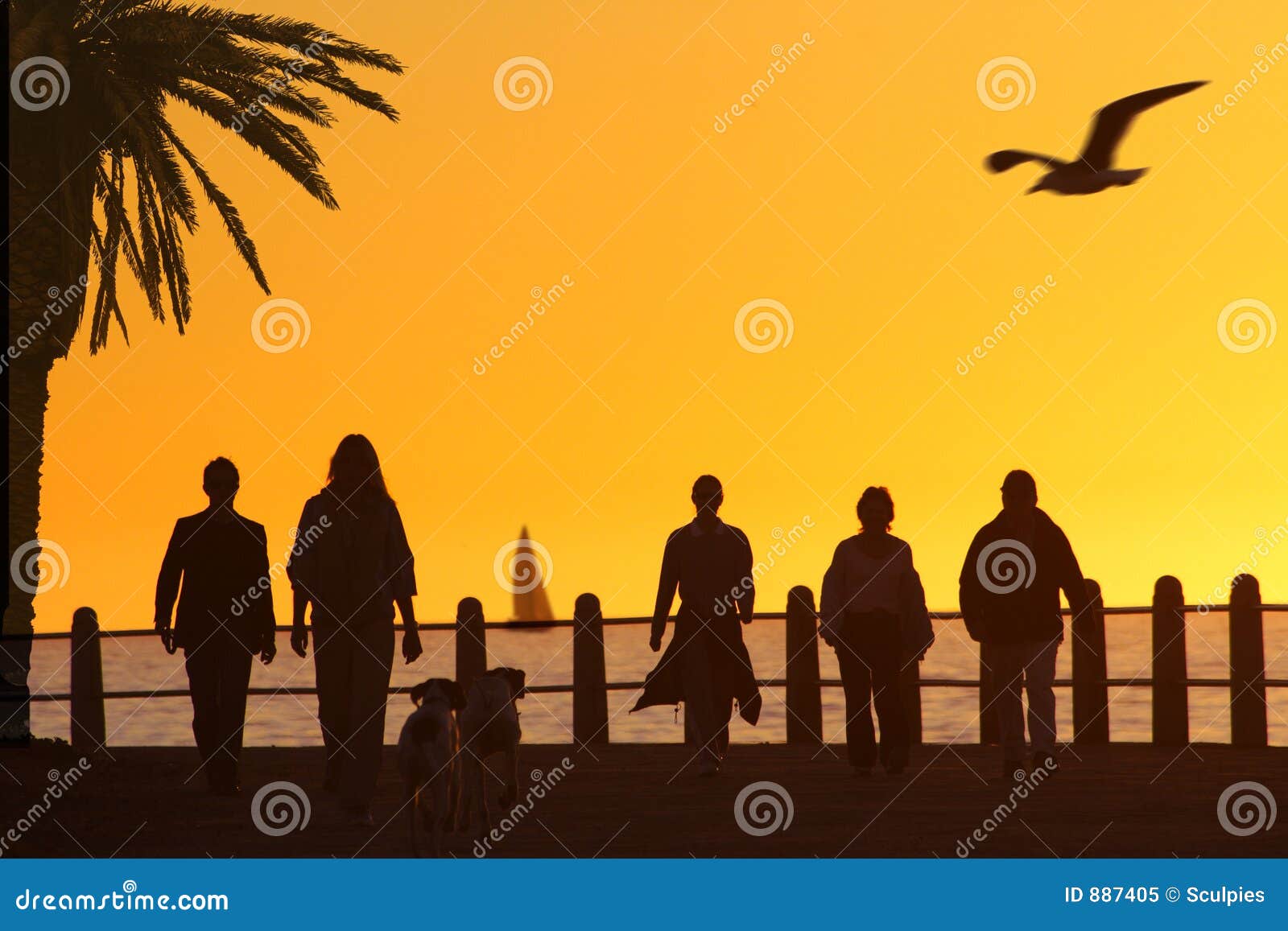 Beach promenade sunset a stock image. Image of strolling - 887405