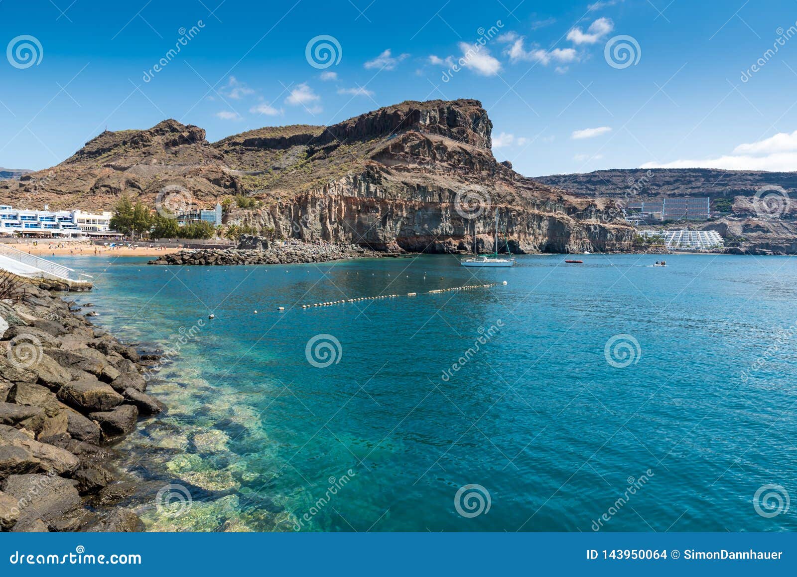 Beach at Puerto Mogan - Playa Mogan Stock Photo - Image of rico, blue ...