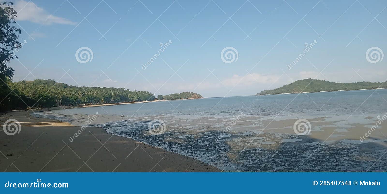 A Beach with Receding Sea Water Stock Photo - Image of receding ...
