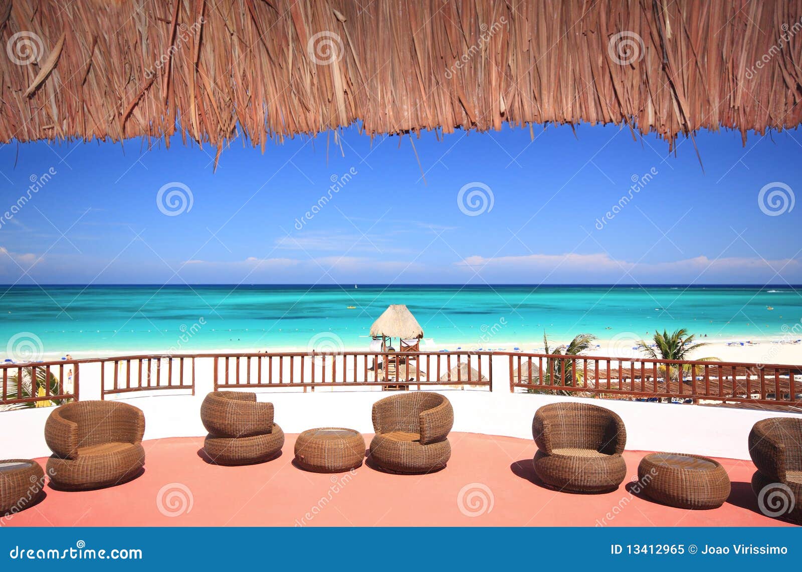 Beach Resort with a Thatched Roof Overlooking Trop Stock Image - Image ...