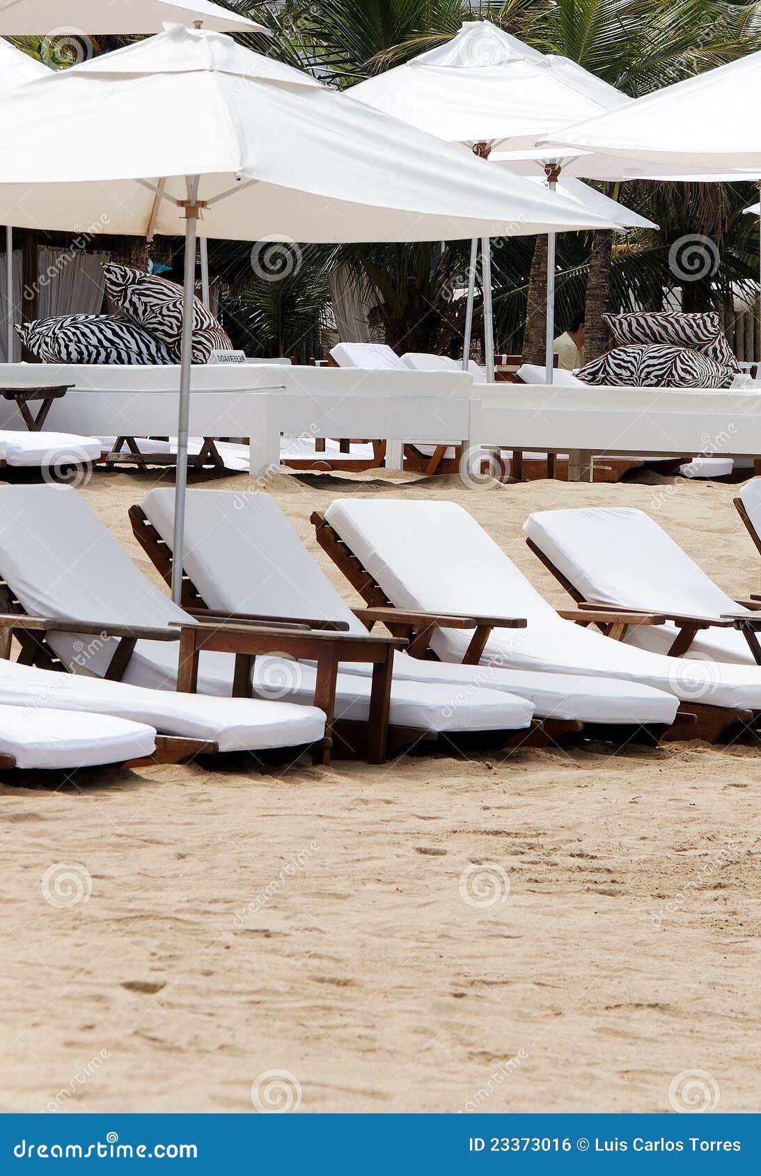 Beach rest area stock photo. Image of beach, palm, pillow - 23373016