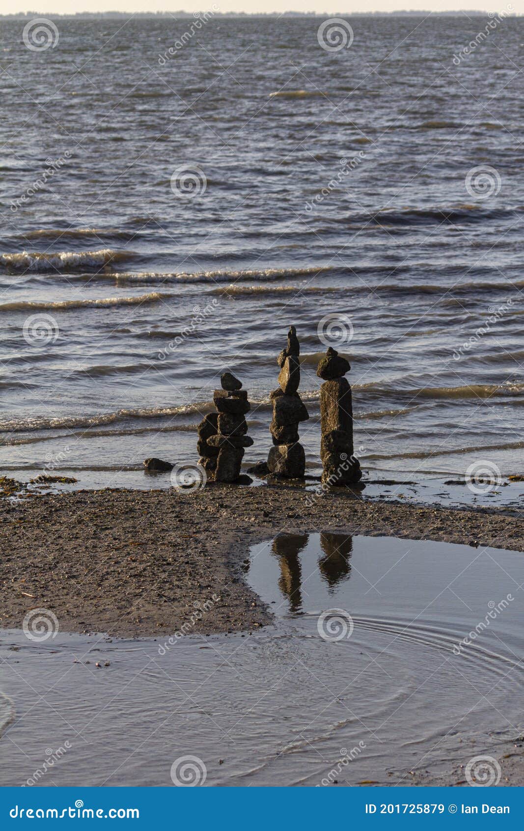 Beach Rock Towers with Reflection Stock Image - Image of rocks, waves ...