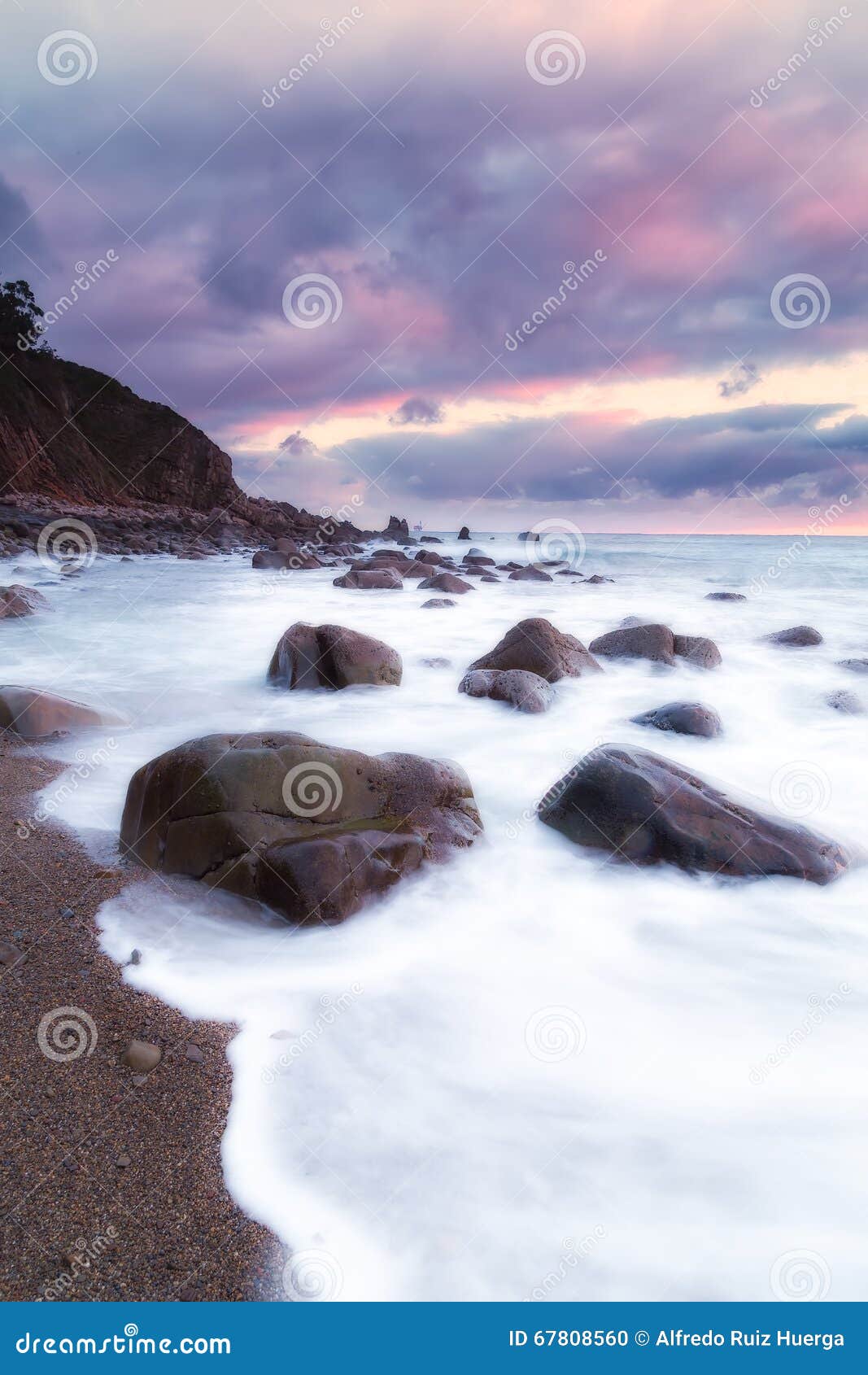 Beach with rocks stock photo. Image of rock, foam, sunrise - 67808560