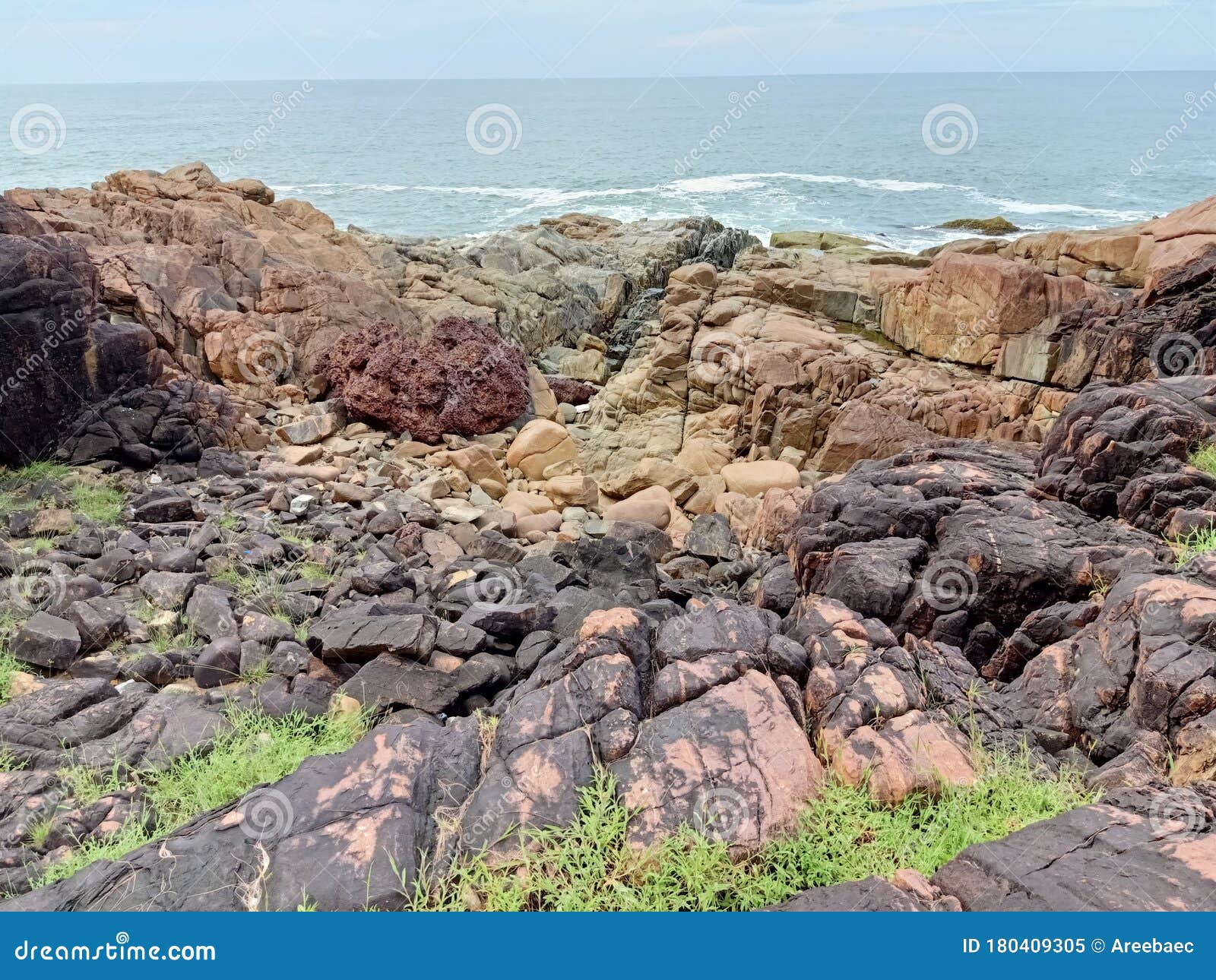 Rocks on beach side stock image. Image of cape, cove - 180409305