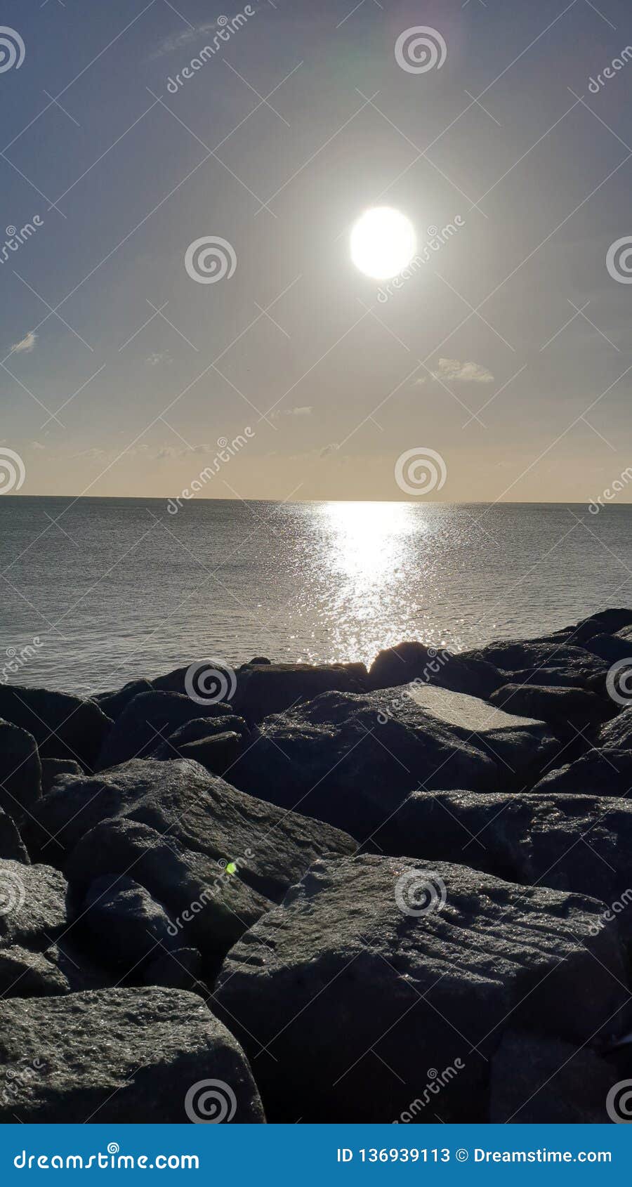 This beach rocks! stock image. Image of reflecting, beach - 136939113