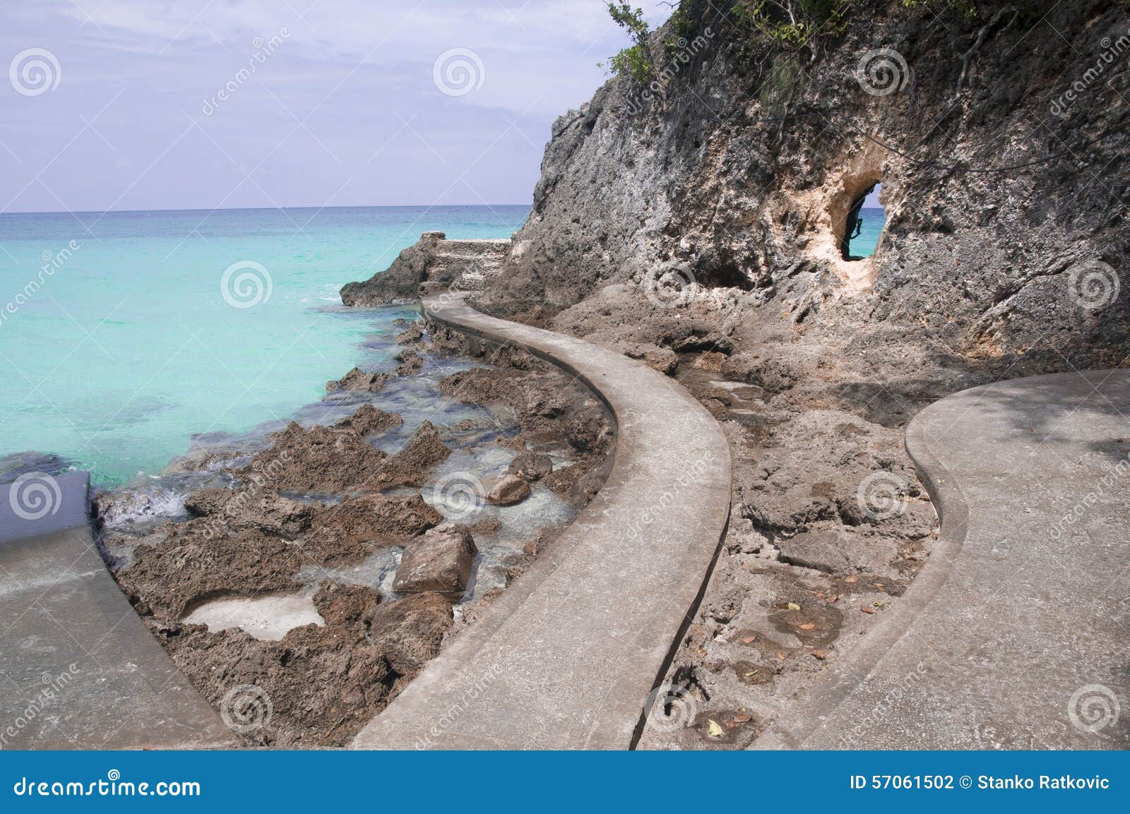 Beach with rocks in water stock photo. Image of beautiful - 57061502