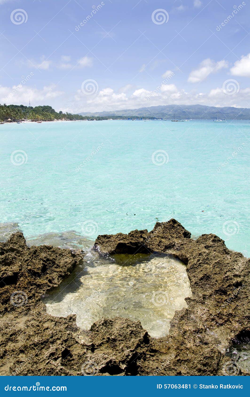 Beach with rocks in water stock image. Image of gentle - 57063481
