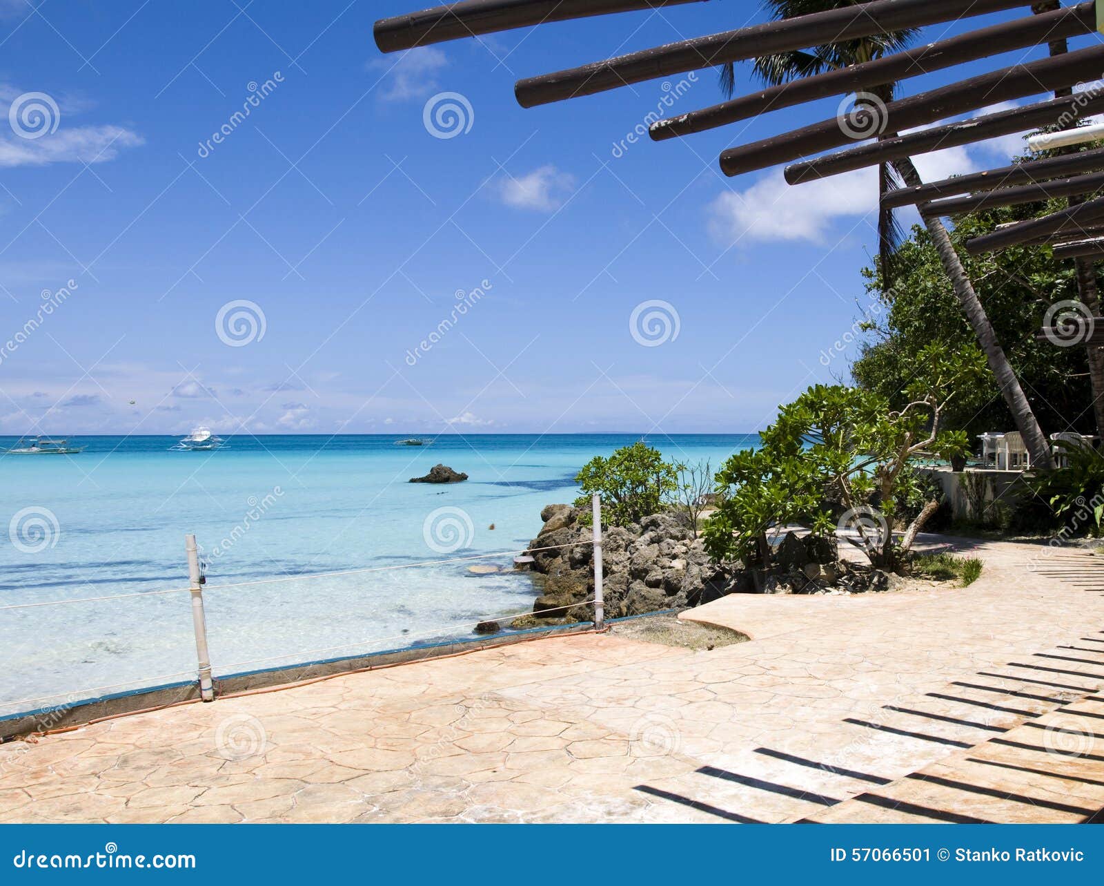 Beach with rocks in water stock image. Image of clear - 57066501