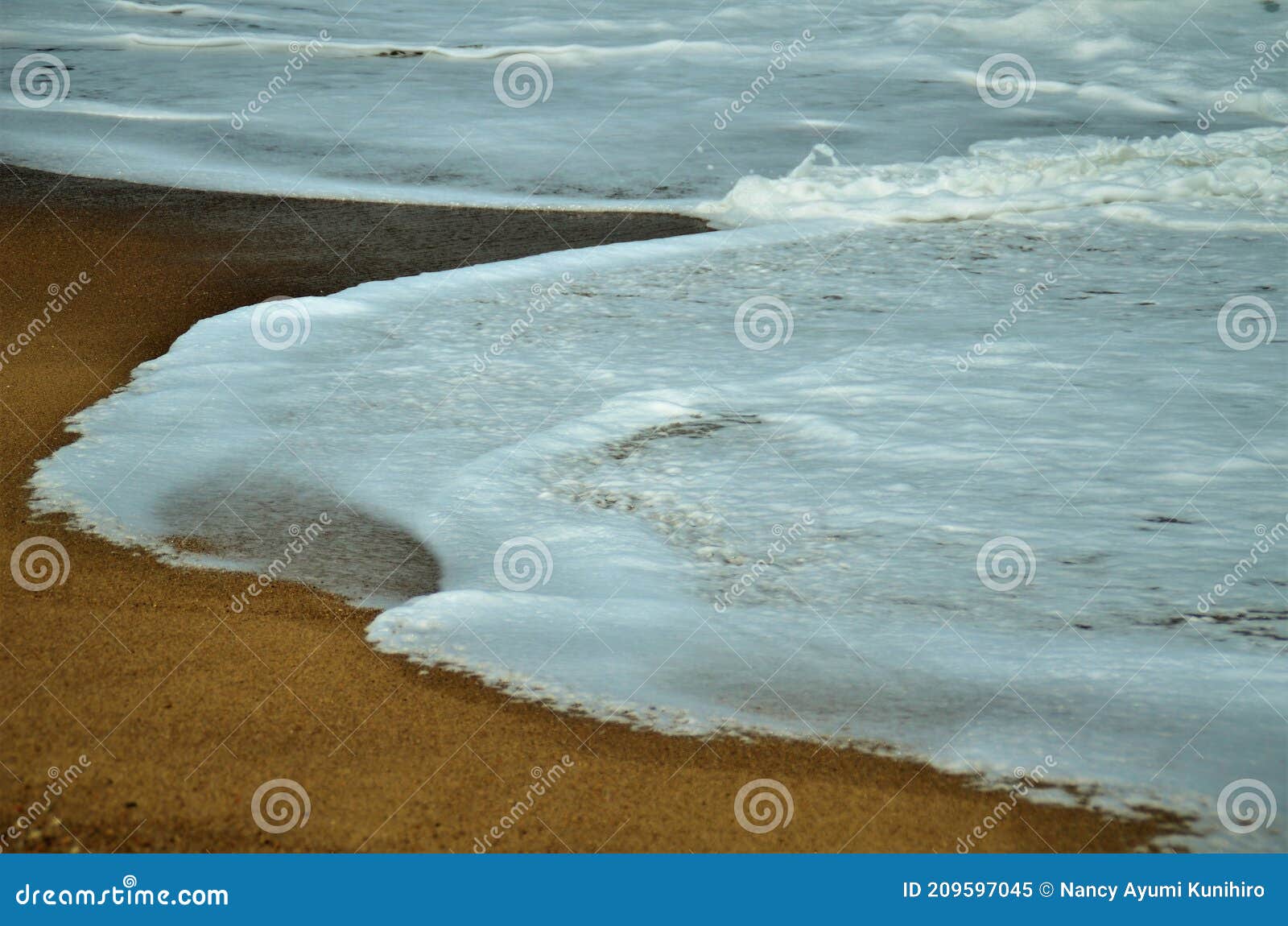 Foam Wave of Sea Water on the Beach Stock Image - Image of north, sands ...