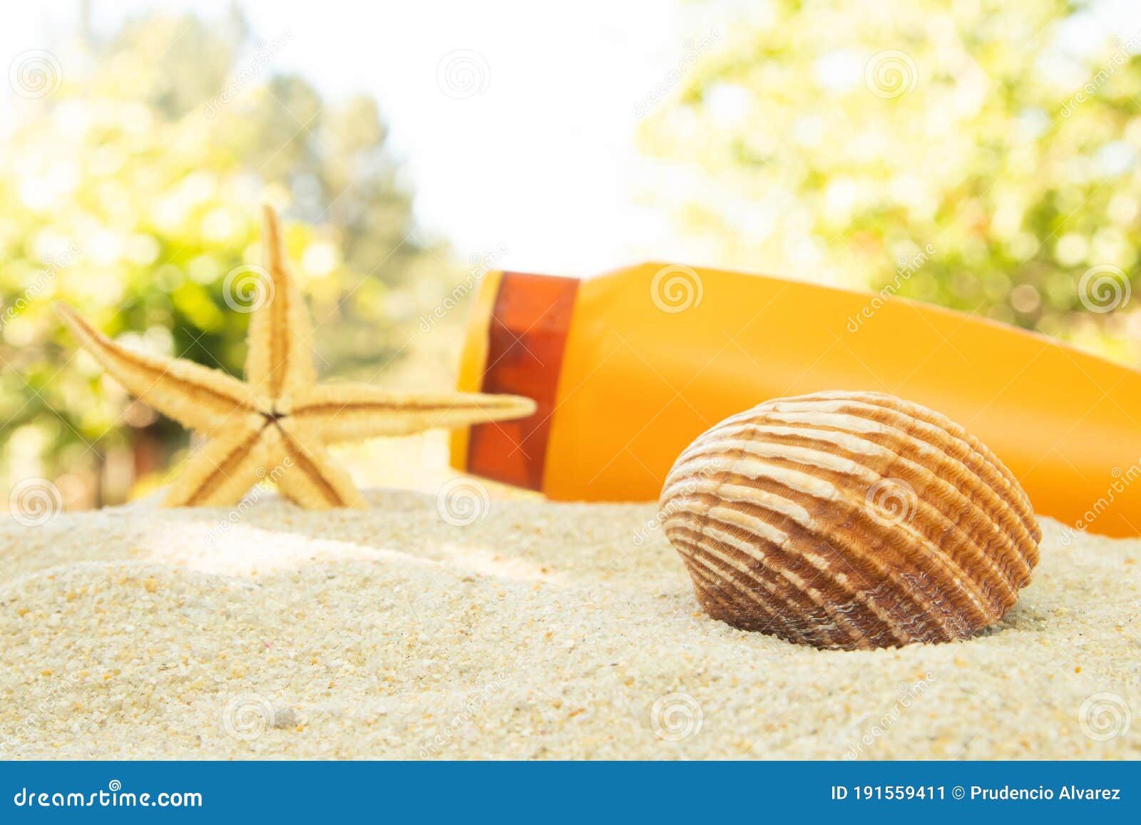 Sun cream on the beach stock image. Image of sand, heat - 191559411