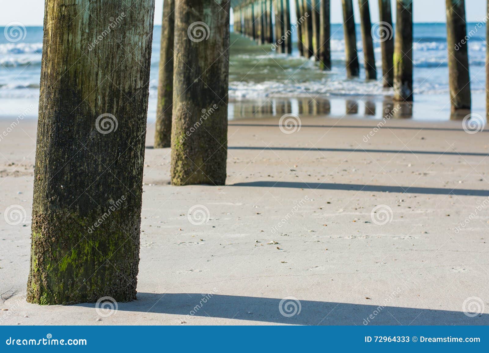 Beach Scene, Close Up of Beach Pier Posts. Stock Image - Image of ...