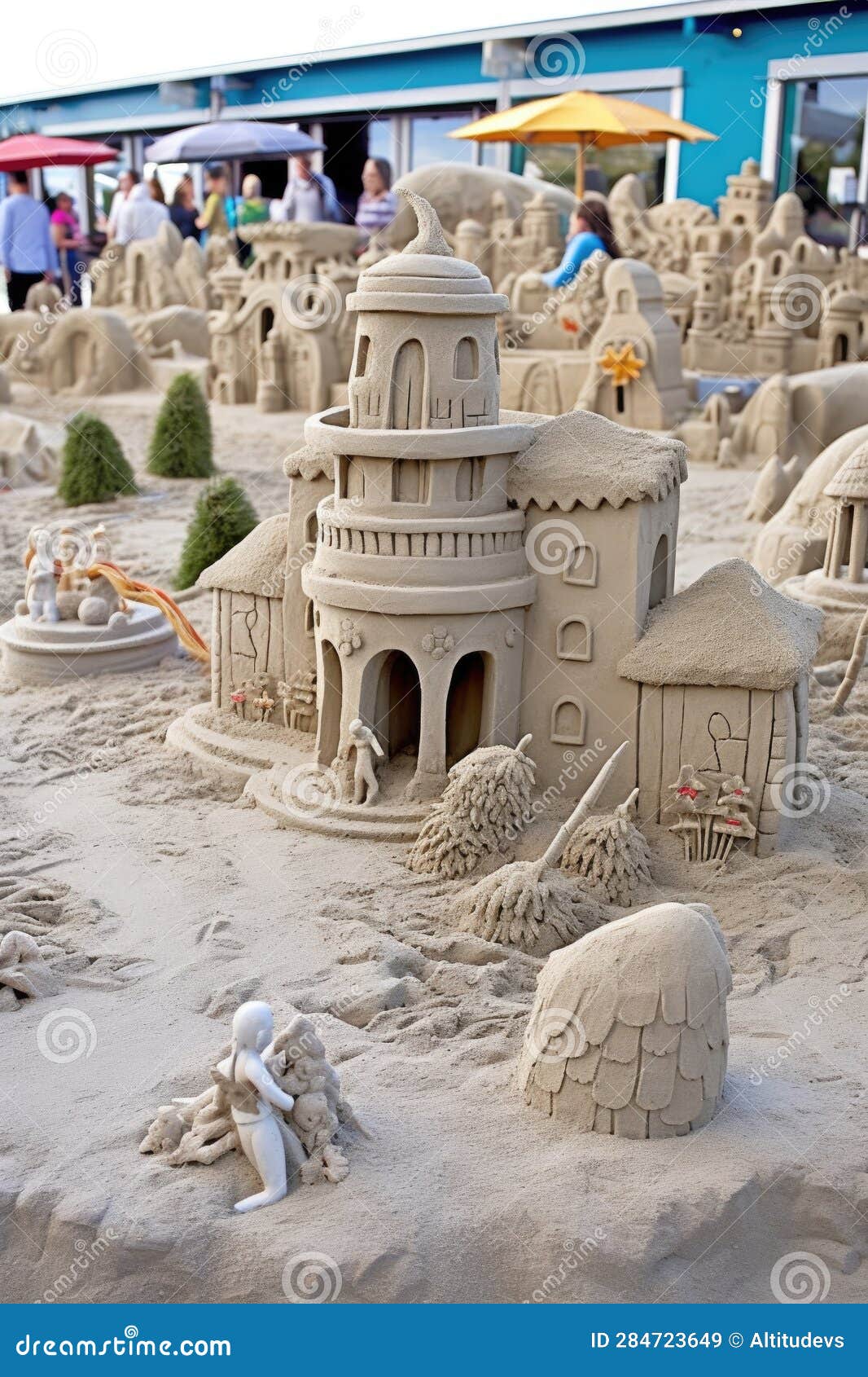 Beach Scene with Holiday-themed Sand Sculptures and Decorations Stock ...