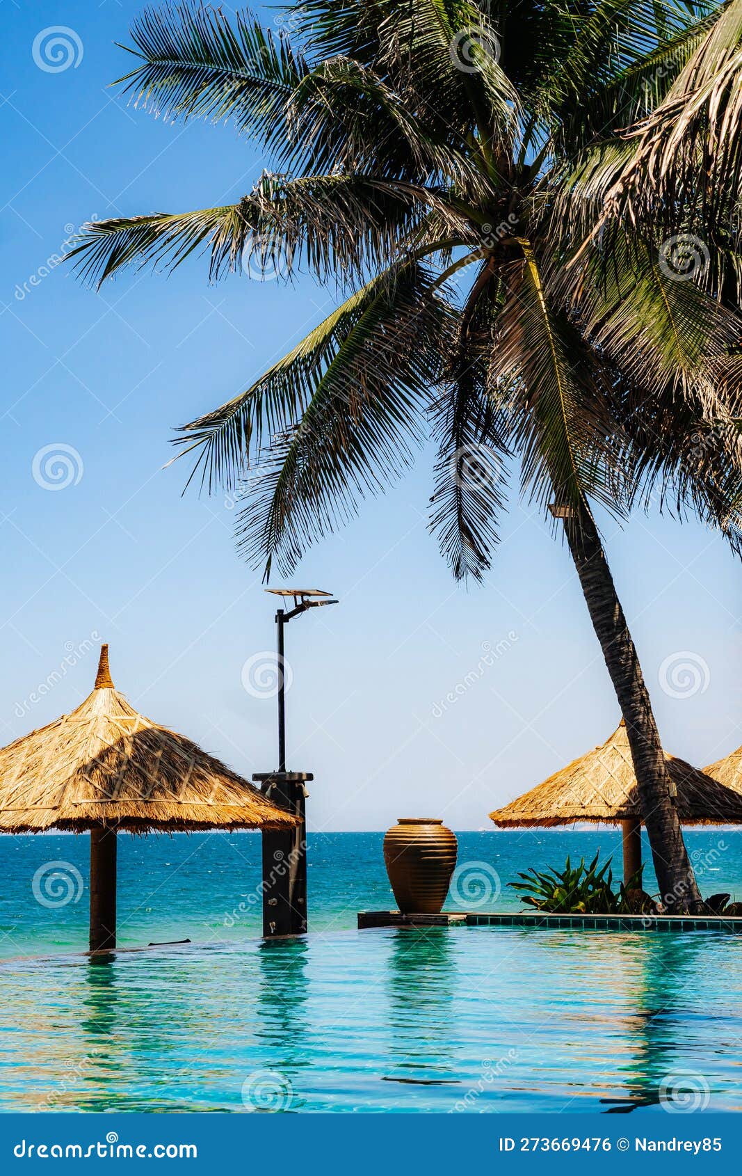 A Beach Scene with a Palm Tree and a Beach Hut Stock Photo - Image of ...